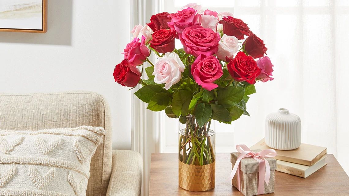 Pink and red roses in a vase