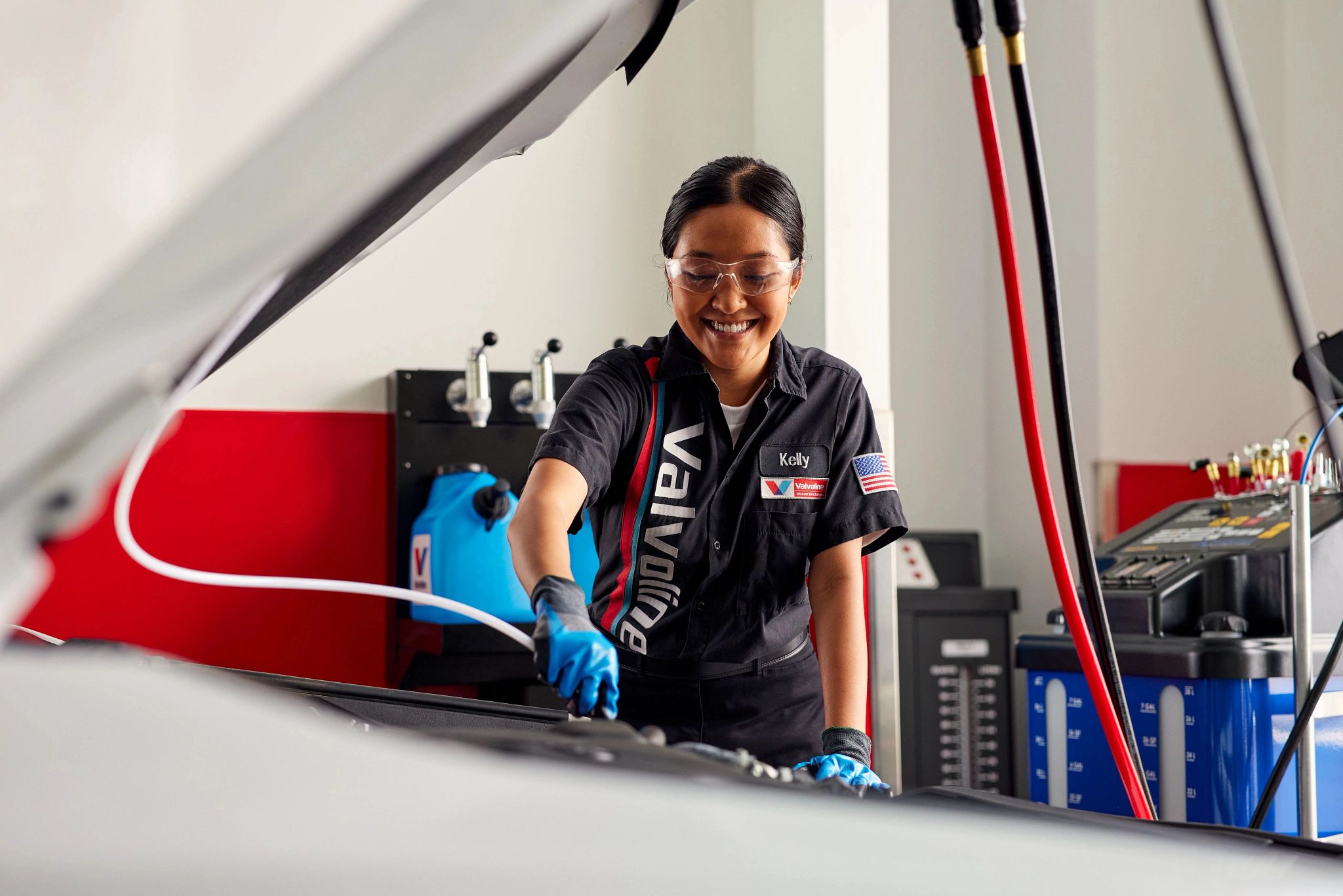 Valvoline Worker changing a car oil